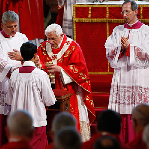 Papal Master of Ceremonies on receiving Communion